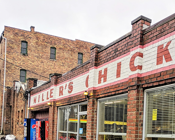 The iconic red and white brick exterior of Miller's Chicken stands as Athens' monument to fried poultry perfection, unchanged by time or trends.