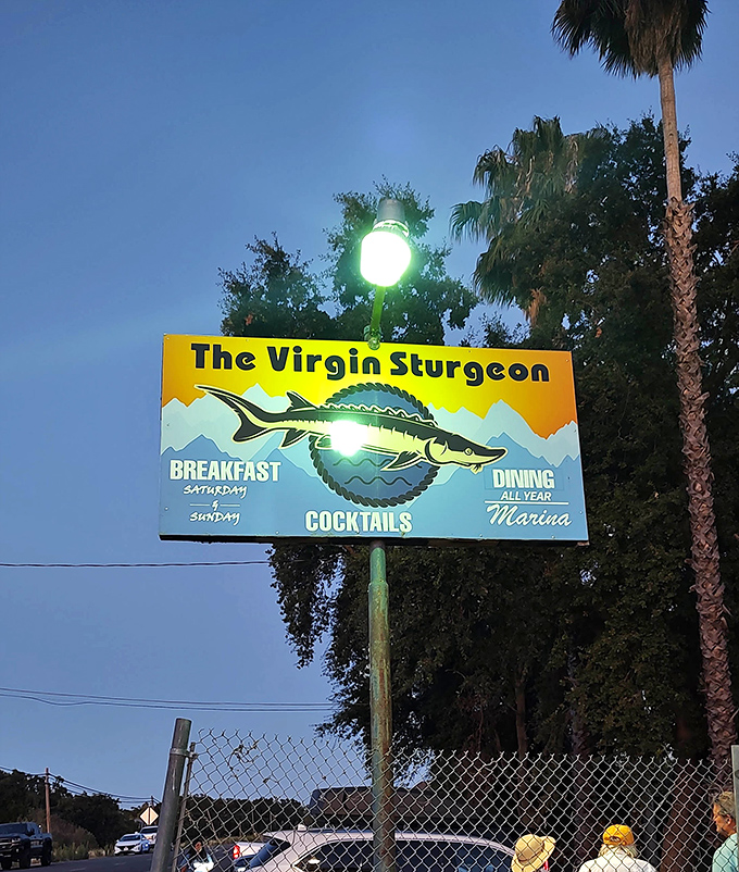 That bright yellow sign isn't just catching your eye—it's promising breakfast, cocktails, and dining with a side of Sacramento River views.