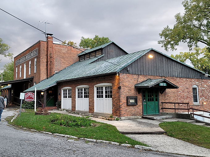 The historic brick facade of Pioneer Mill stands proudly in Tiffin, where time-honored traditions meet modern culinary excellence.