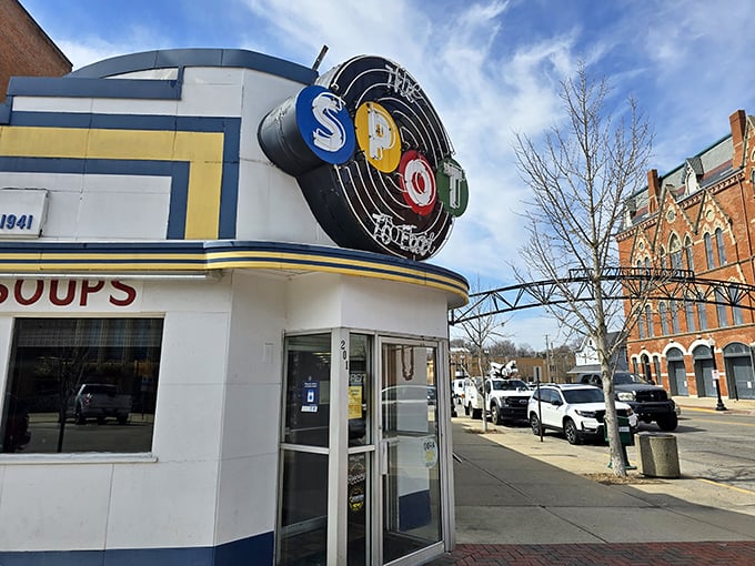The architectural time machine that is The Spot Restaurant, with its iconic neon sign promising comfort food salvation to all who enter.