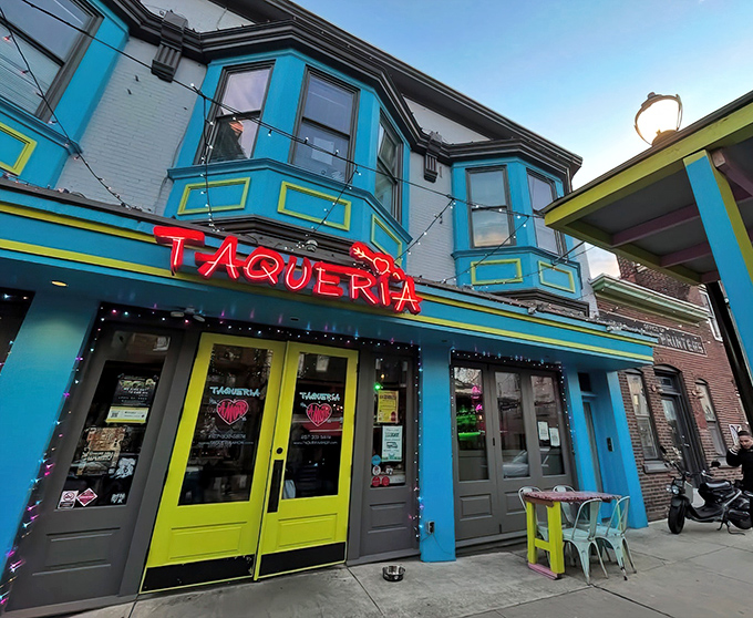 The turquoise and yellow fa&ccedil;ade of Taqueria Amor isn't just a restaurant entrance&mdash;it's a mood-lifting color therapy session that promises delicious things inside.