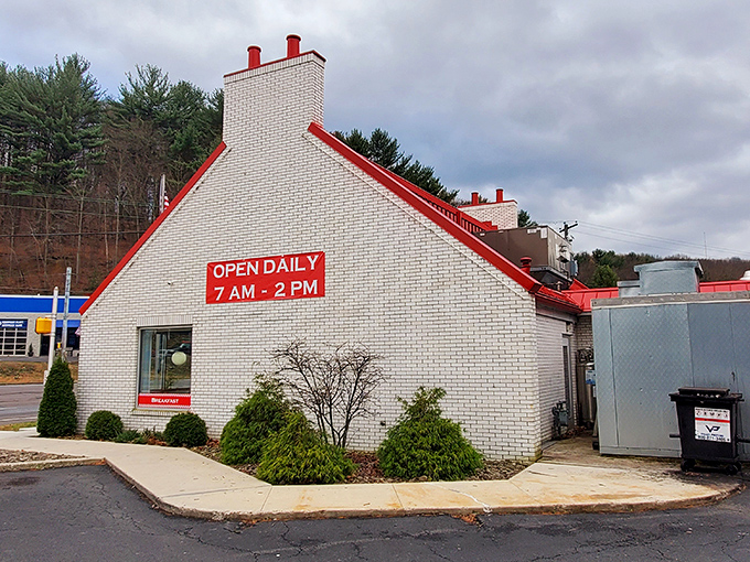 The white brick fortress of flavor stands proudly with its distinctive red trim, beckoning hungry travelers with the promise of comfort food paradise.