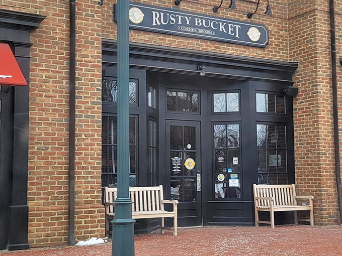 The brick fa&ccedil;ade and wooden benches at Rusty Bucket's entrance aren't just charming&mdash;they're practically whispering "come in, stay awhile" to every passerby.