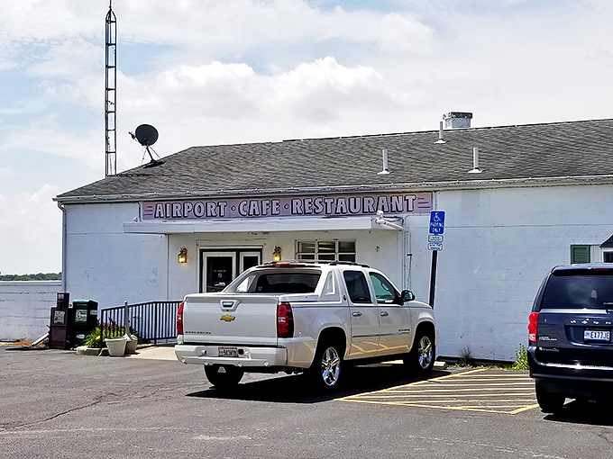 The unassuming exterior of Airport Cafe at Grimes Field promises no frills, just honest food that'll make your taste buds do a happy dance.