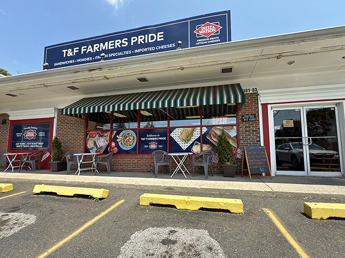 That striped awning might as well be a beacon calling sandwich pilgrims home to hoagie heaven.