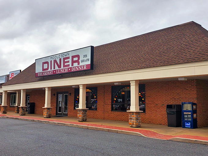 The iconic red lettering of Middletown Diner stands like a beacon of breakfast hope against the Delaware sky. Open 6AM to 9PM for all your comfort food cravings.