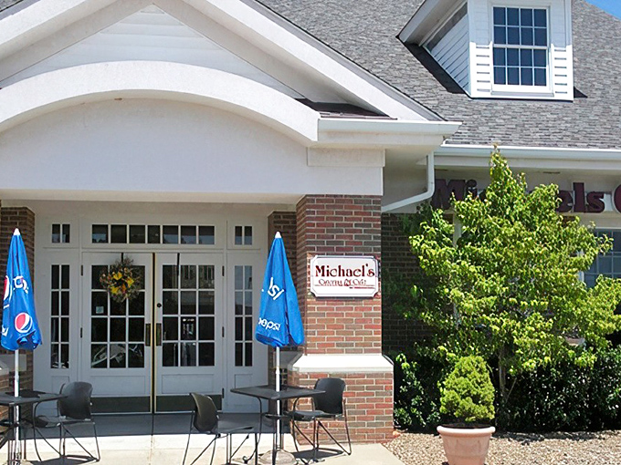 The welcoming exterior of Michael's beckons like an old friend, complete with blue umbrellas promising shade for those sunny Ohio afternoons.