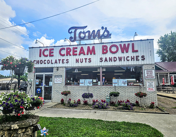 This unassuming facade hides Ohio's temple of frozen delight. The flower baskets add a touch of charm that says "homemade" before you even step inside.