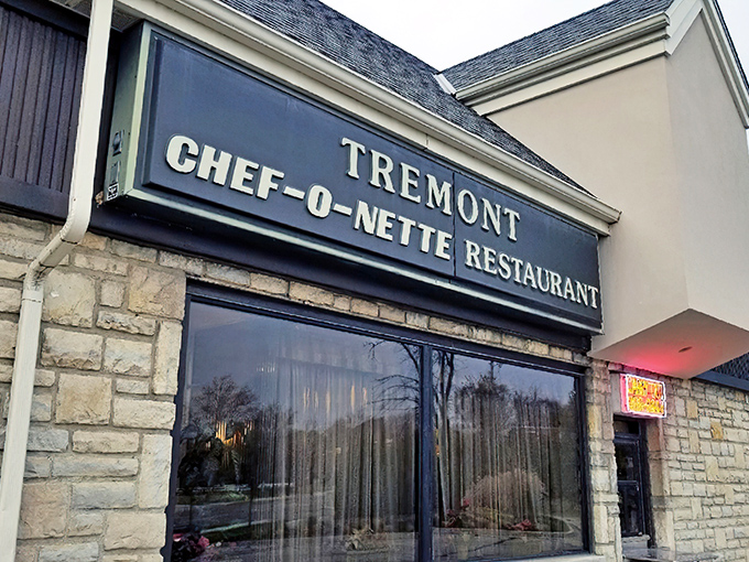 The stone facade of Tremont Center houses this beloved time capsule of American dining. Chef-O-Nette's sign promises comfort food that's stood the test of time.