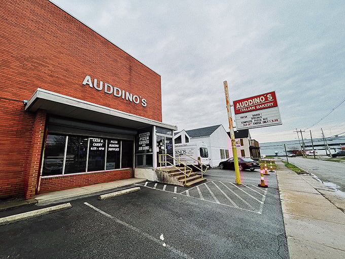 The unassuming brick exterior of Auddino's might not scream "food destination," but locals know this sign marks the spot where carb dreams come true.