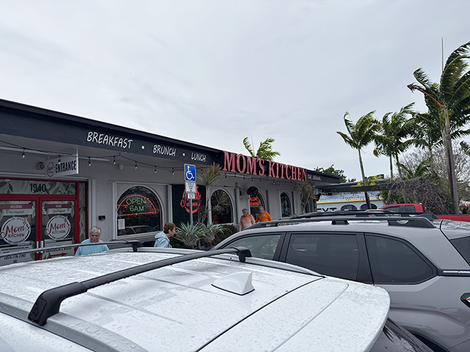 The red letters beckon like an old friend: "Mom's Kitchen" &ndash; where breakfast dreams come true and diet plans go to die.