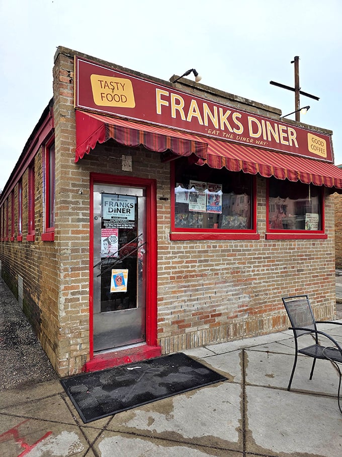 The iconic red exterior of Frank's Diner beckons hungry travelers like a culinary lighthouse on Kenosha's shore. "Tasty Food" isn't just a sign&mdash;it's a promise.