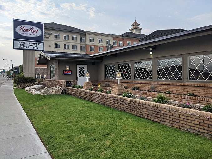 Smitty's welcomes hungry travelers with its classic brick exterior and iconic sign&mdash;a beacon of breakfast hope on Idaho Falls' horizon.