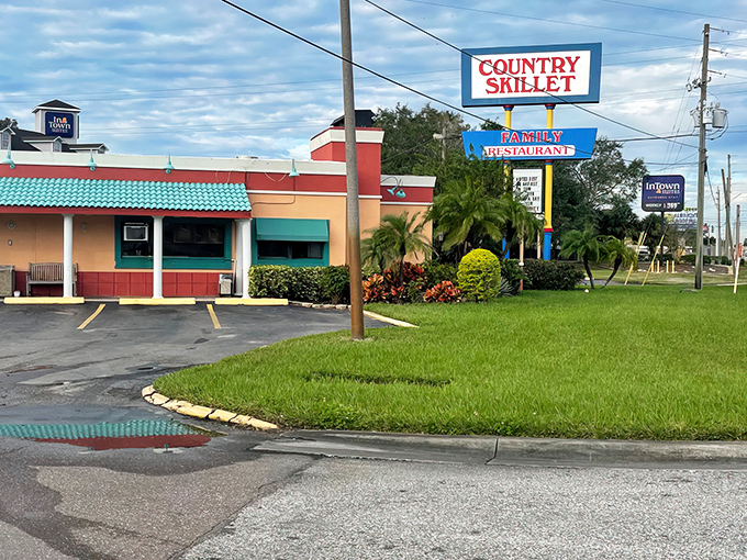 The unassuming exterior of Country Skillet beckons with its colorful facade and no-nonsense signage. Florida's hidden breakfast treasures often wear the simplest disguises.