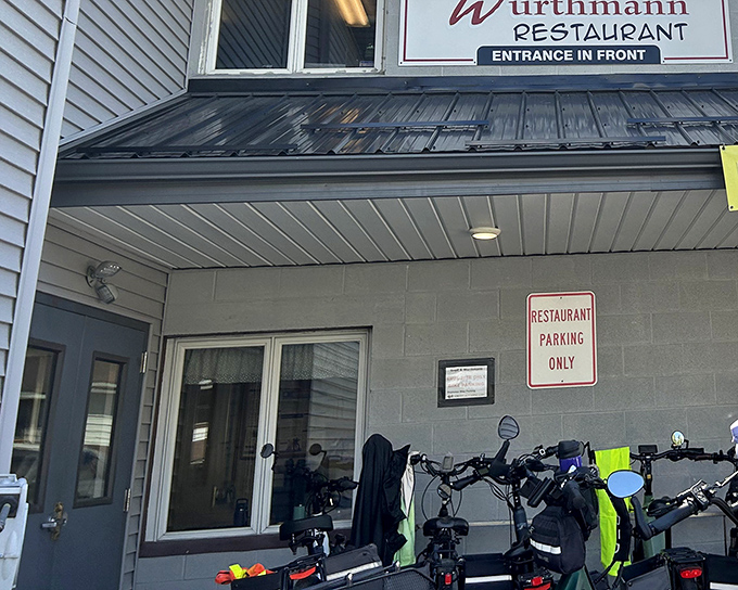 The unassuming white exterior of Boyd & Wurthmann beckons like an old friend, promising comfort food treasures within its humble walls.