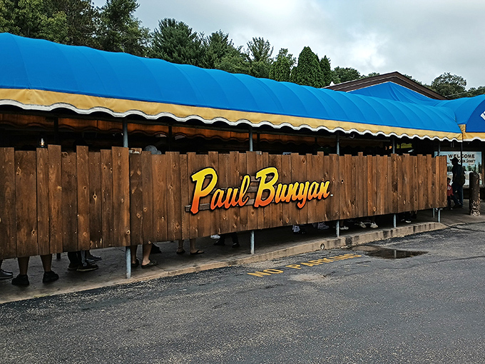 That iconic sign isn't just promising a meal—it's announcing a Wisconsin pilgrimage where lumberjack-sized appetites go to surrender in the most delicious way possible.