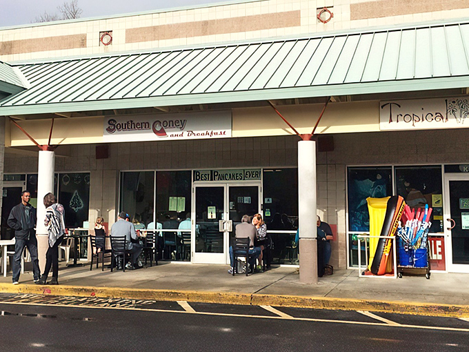 The storefront promises big flavors in a humble package, with outdoor seating that locals claim first on sunny mornings.