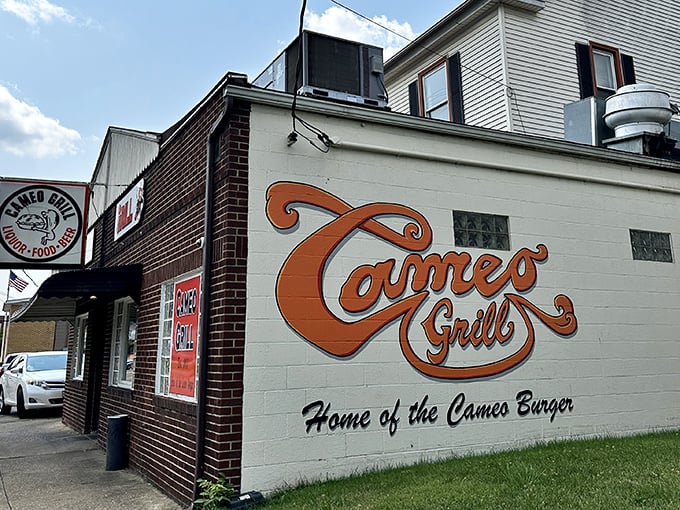 The brick facade and vintage signage of Cameo Grill stands as a beacon of burger perfection in Massillon, where culinary legends are born without pretense.