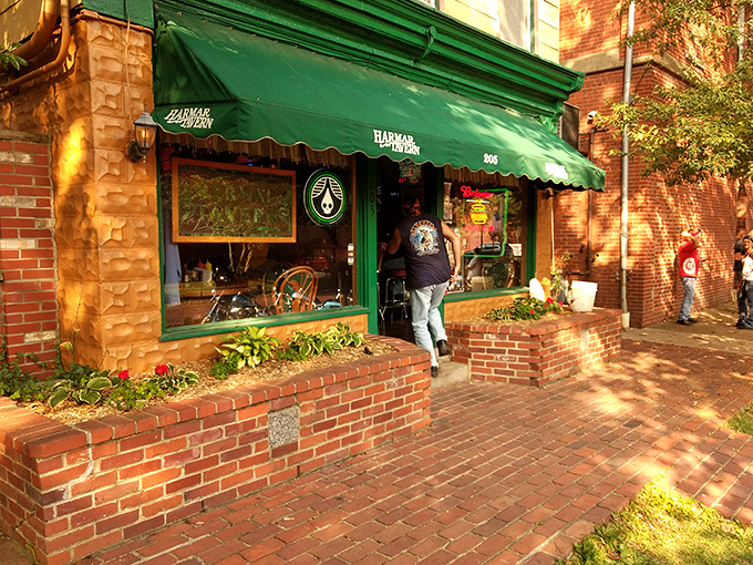 The iconic green awning of Harmar Tavern beckons like an old friend on Marietta's historic brick streets. Some buildings just look like they have stories to tell.