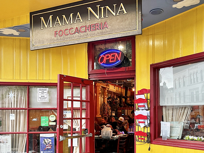 That cheerful yellow facade practically shouts "Come in and eat!" &ndash; Italian hospitality begins before you even cross the threshold.