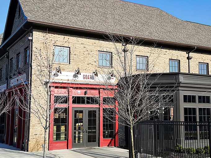 That red entrance practically winks at you from the street, promising good times and better food inside.