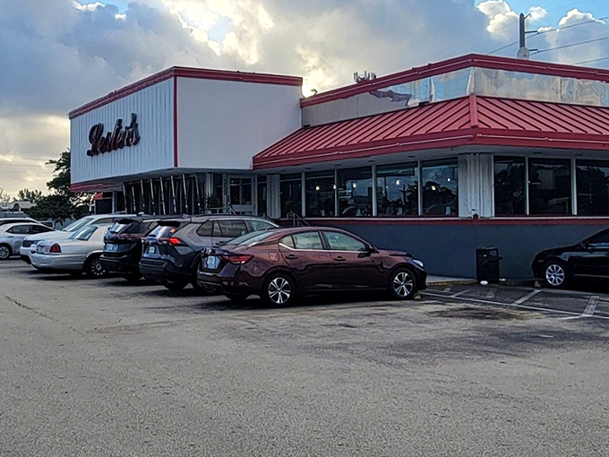 Lester's iconic red-trimmed exterior stands as a beacon of breakfast hope in Fort Lauderdale, promising comfort food that transcends trendy culinary fads.