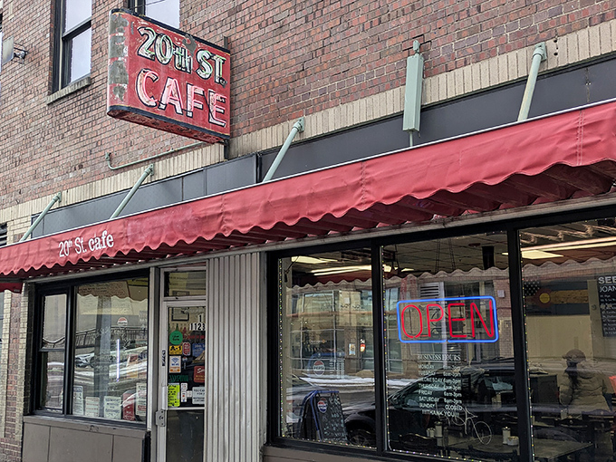 That weathered "20th St. Caf&eacute;" sign has witnessed decades of Denver history, beckoning hungry locals like a culinary lighthouse.