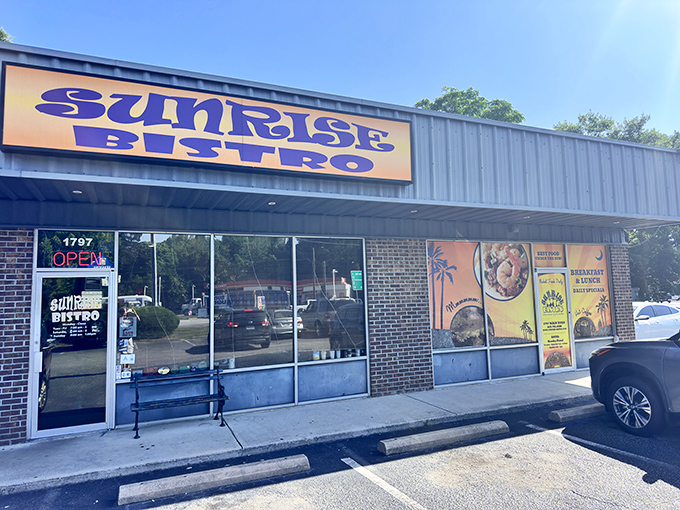 The bright yellow sign of Sunrise Bistro beckons like a culinary lighthouse on Johns Island, promising breakfast treasures for those wise enough to stop.
