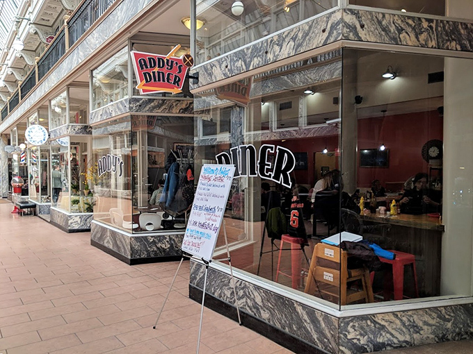 Addy's Diner glows like a beacon of breakfast hope in Cleveland's cityscape, promising comfort food salvation behind those gleaming windows.