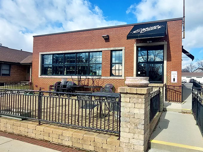 Winter sunshine bathes Starliner's fa&ccedil;ade, where the patio waits patiently for warmer days and breakfast enthusiasts seeking their morning orbit.