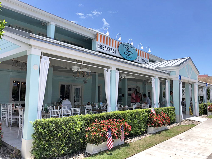 The turquoise facade of Doreen's Cup of Joe stands like a beacon of breakfast hope on Marco Island, promising morning salvation one waffle at a time.