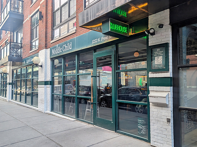 The green awning beckons like an old friend on Fishtown's Front Street, promising comfort food with a twist inside this brick-faced beauty.