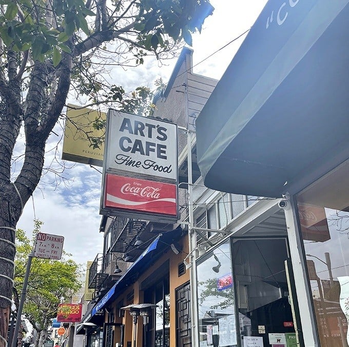 The unassuming storefront of Art's Cafe stands like a time capsule on Irving Street, promising "Fine Food" with zero pretension and 100% delivery.