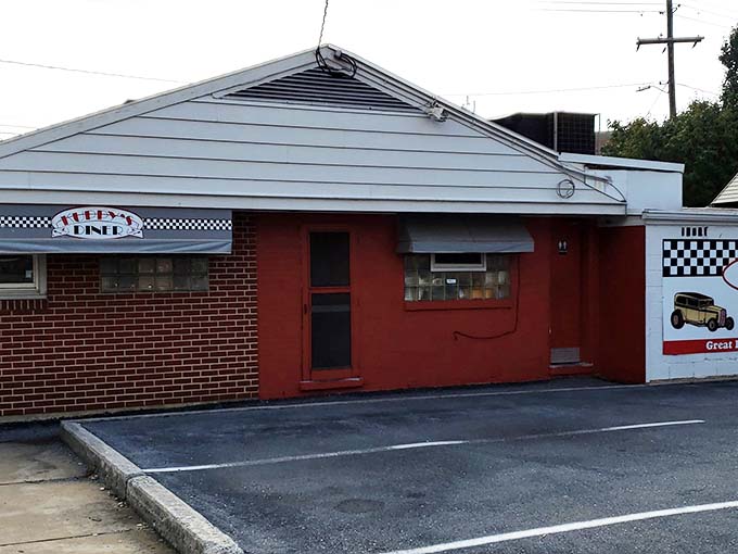 The red brick exterior of Kuppy's Diner stands as a time capsule in Middletown, where hungry patrons have been finding comfort food salvation since FDR was in office.