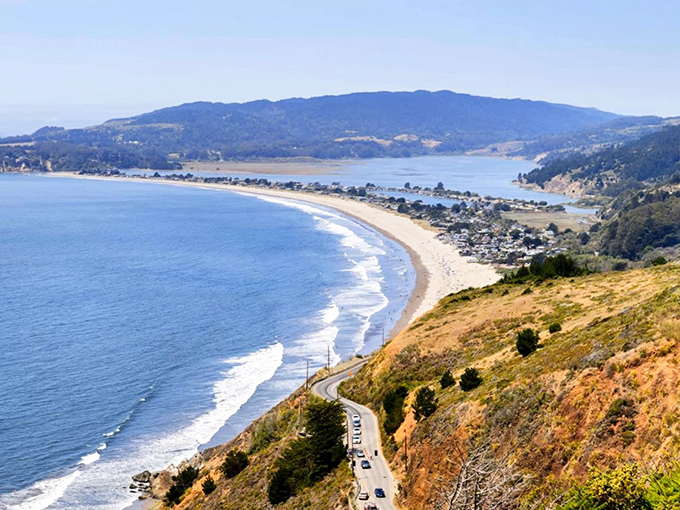 The curve of Bolinas Beach stretches like nature's smile, where the Pacific meets golden sand in a perfect California embrace.