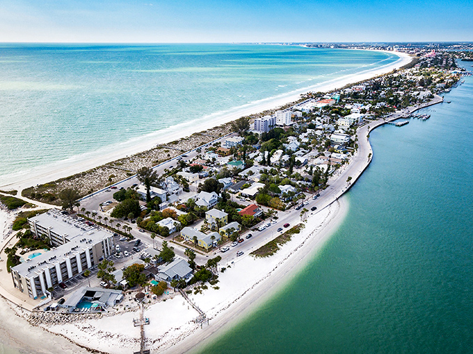 Aerial paradise! This slender strip of Florida heaven offers the rare chance to see both Gulf and bay waters in one breathtaking glance.
