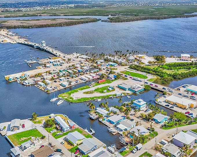 The aerial view reveals Pine Island's unique charm &ndash; a patchwork of waterfront homes connected by canals, where boats replace second cars.