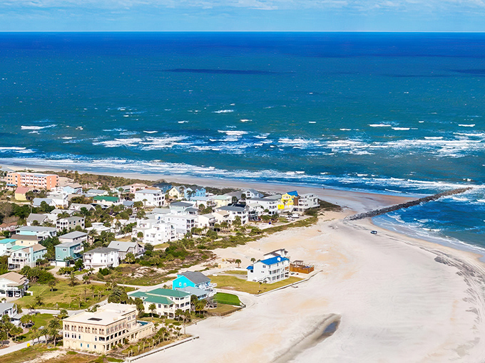 St. Augustine Beach stretches out like nature's welcome mat, where pastel beach houses dot the shoreline and the Atlantic whispers "slow down, you're on vacation now."
