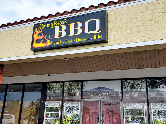 Jimmy Bear's BBQ storefront beckons from its unassuming strip mall location, proving once again that the best barbecue treasures often hide in plain sight.