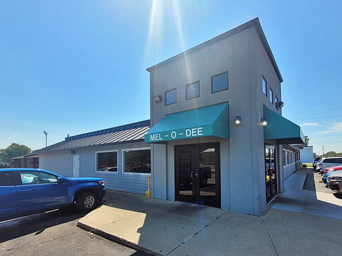 The iconic teal awning of Mel-O-Dee beckons like a culinary lighthouse on the Ohio landscape. Simple exterior, extraordinary flavors await inside.