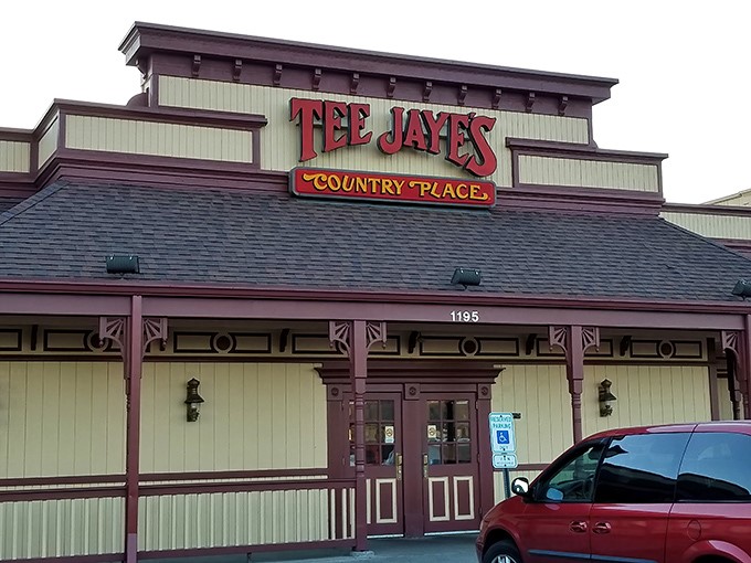 The iconic red Tee Jaye's sign welcomes hungry travelers like a lighthouse guiding ships to breakfast harbor. Country charm meets roadside comfort.