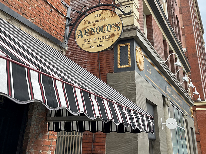 That iconic striped awning and vintage sign aren't trying to be retro-cool&mdash;they're the real deal, standing sentinel on Cincinnati's East 8th Street since long before "vintage" was trendy.