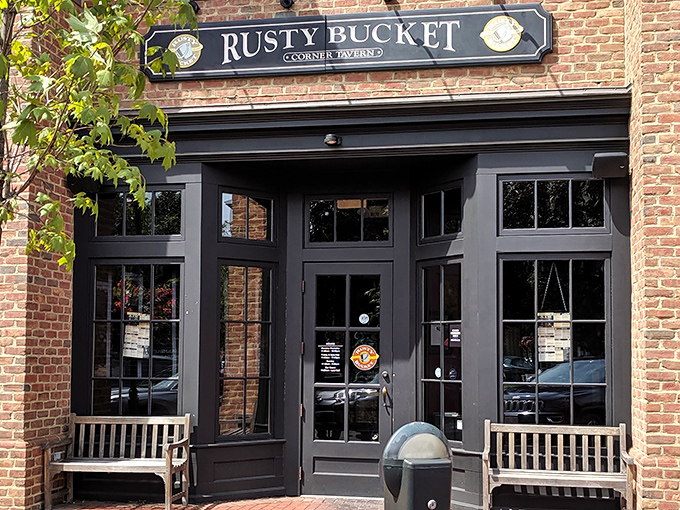 The brick fa&ccedil;ade and wooden benches at Rusty Bucket's entrance aren't just charming&mdash;they're practically whispering "come in, stay awhile" to every passerby.