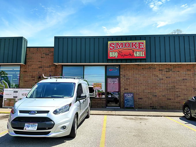 The unassuming brick exterior of Smoke BBQ hides culinary treasures within. Like finding a diamond in a strip mall, this place proves greatness needs no fancy facade.