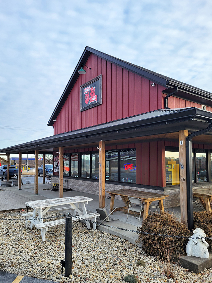 The red barn-like structure of LD's BBQ stands proudly against Wisconsin's blue sky, a beacon of smoked meat salvation in East Troy.