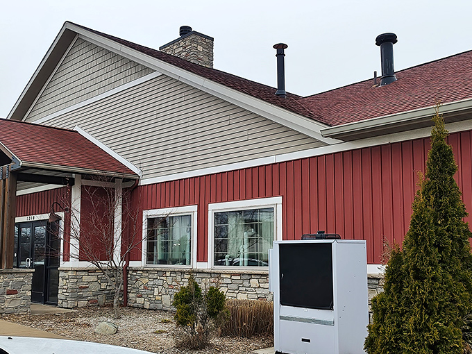 The barn-red walls of Hop Hog glow like a country lighthouse, guiding barbecue pilgrims toward smoky salvation in Greenville&rsquo;s hills.