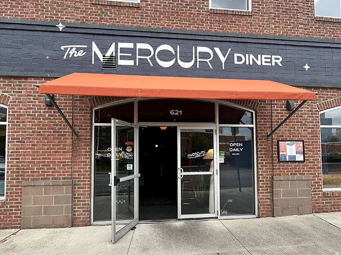 The Mercury Diner's brick fa&ccedil;ade and orange awning beckon like a retro-futuristic beacon on Columbus' High Street. Space-age dining, earthly delights await.