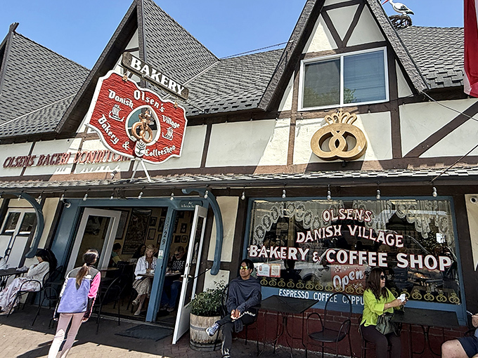 Danish architecture meets California sunshine at Olsen's, where the timber-framed exterior promises authentic Scandinavian delights within those welcoming doors.