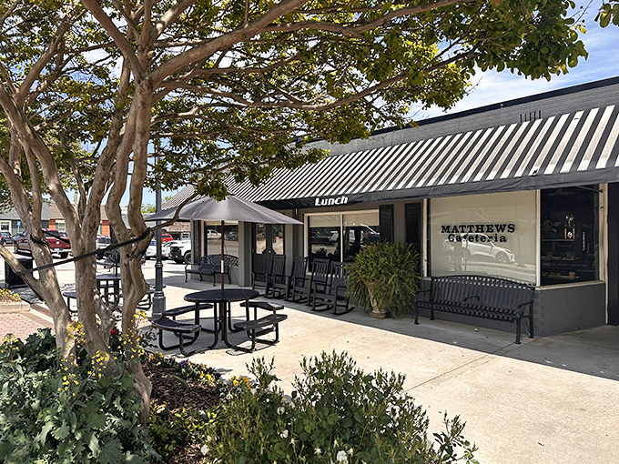 Matthews Cafeteria's welcoming storefront promises a taste of Georgia tradition under its classic striped awning.