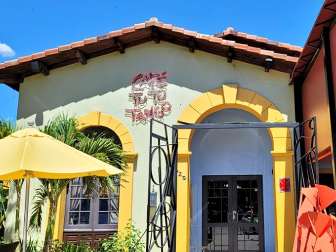 The Spanish-style exterior of Caf&eacute; Tu Tu Tango welcomes you with vibrant colors and quirky sculptures&mdash;like finding a Barcelona side street in the heart of Orlando.